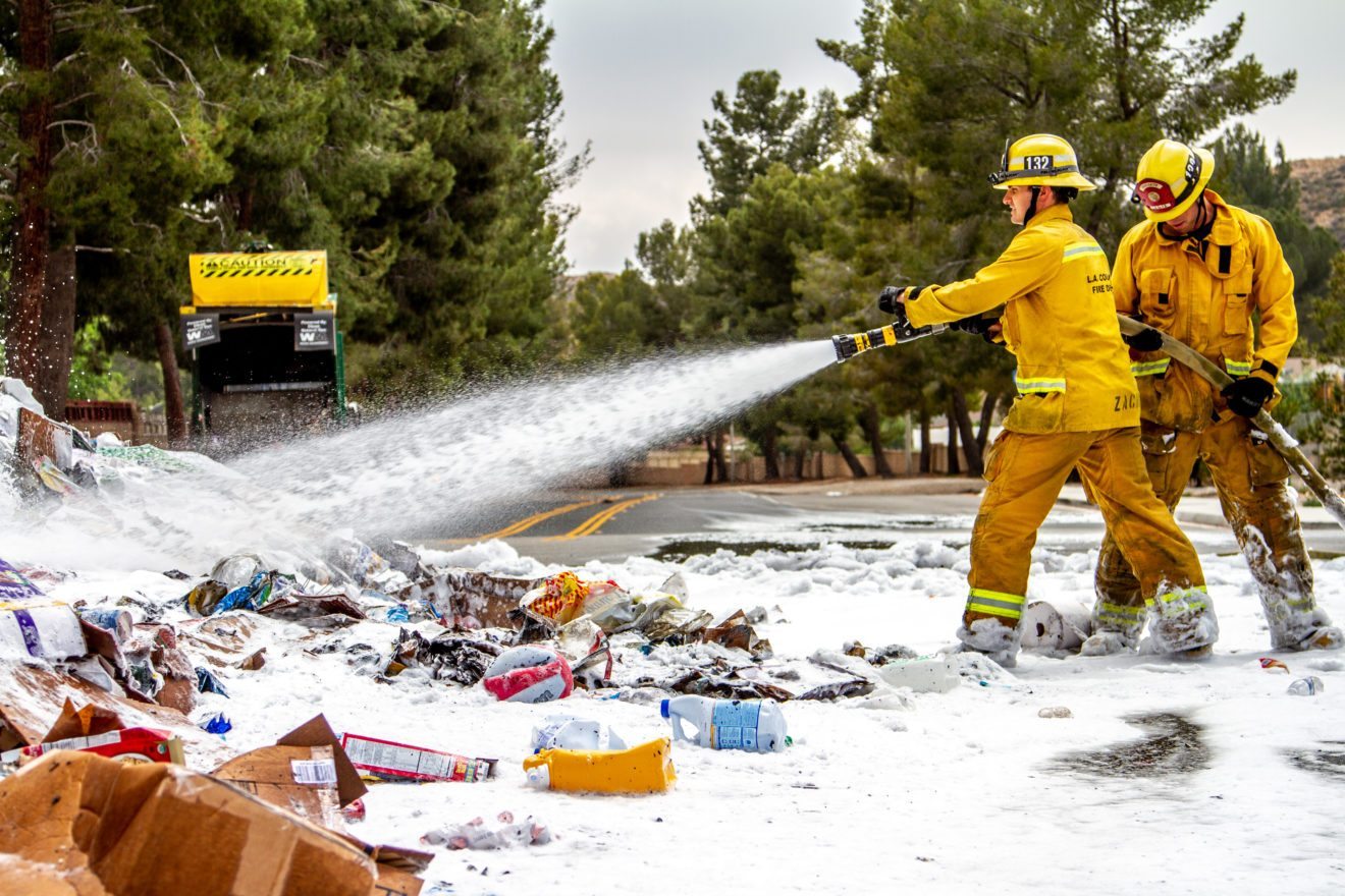 UPDATE: Burning garbage in trash truck dumped on street