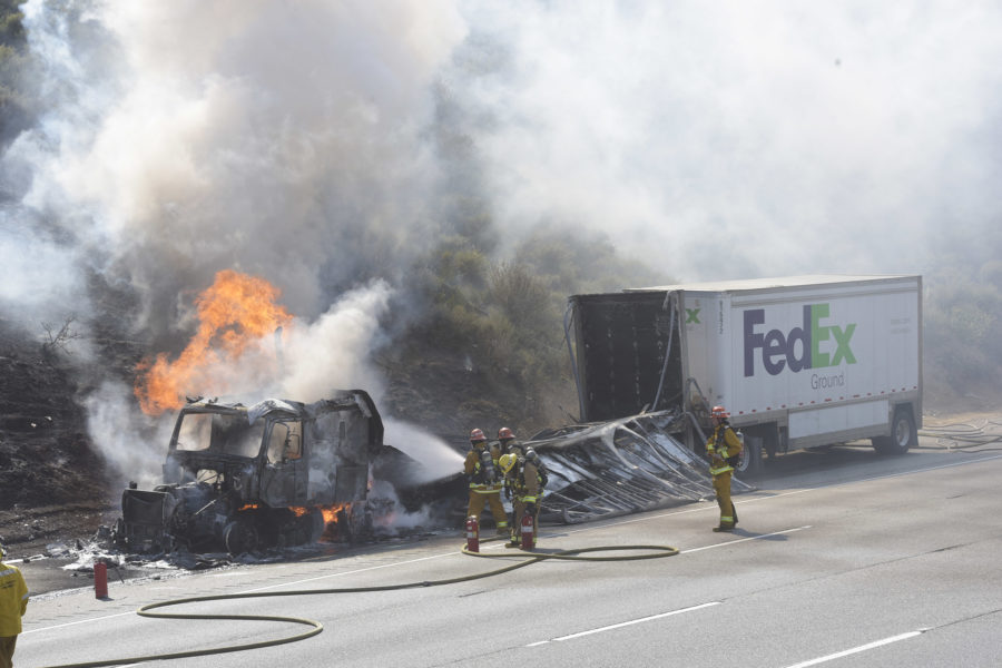 UPDATE: FedEx truck fire sparks brush fire near Lake Hughes Road