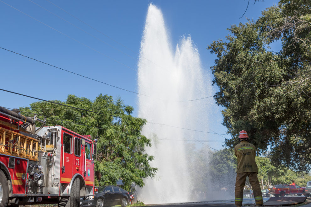Crash fire hydrant cascades water