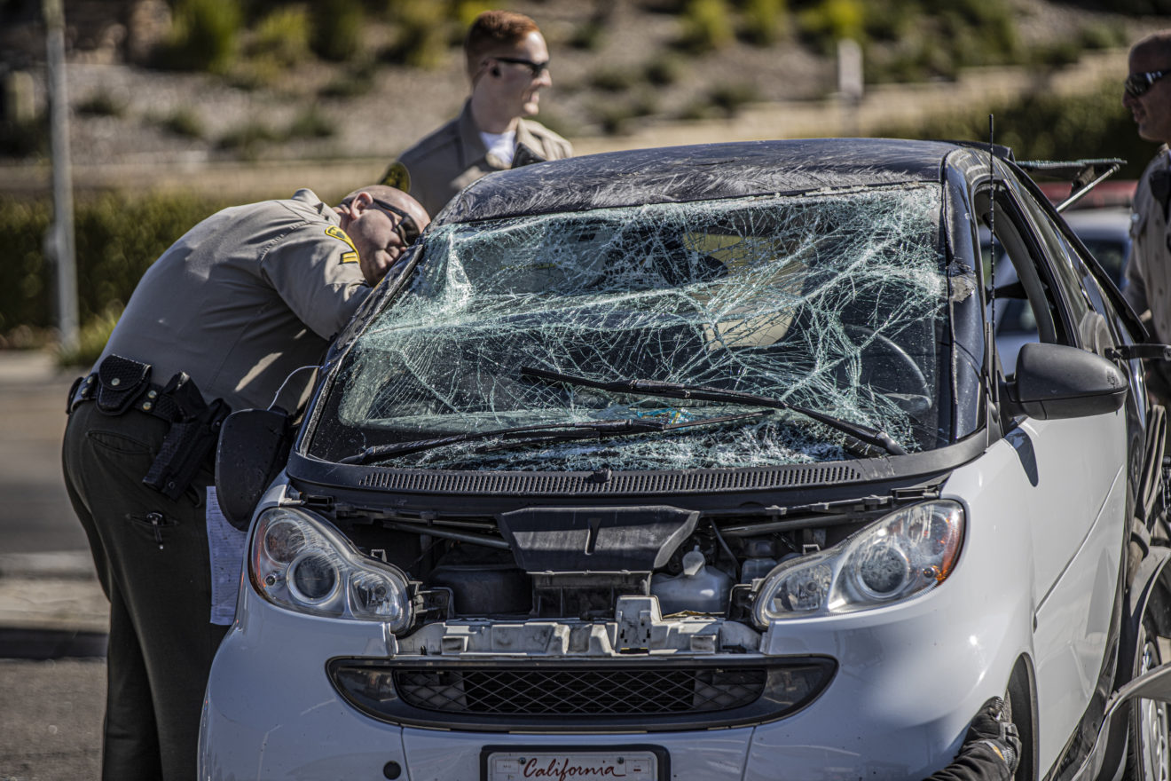 Traffic collision results in overturned vehicle and lane closure