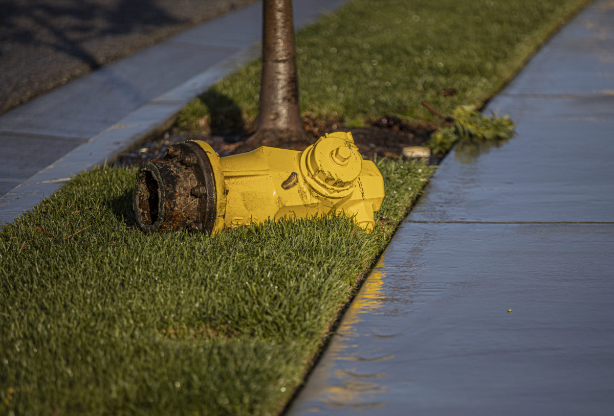 No injuries reported after car shears fire hydrant crash