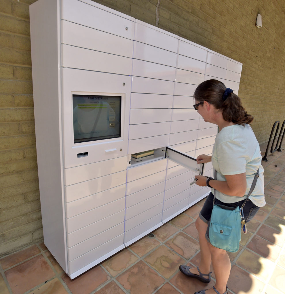 City installs self-service lockers to replace curbside service at ...