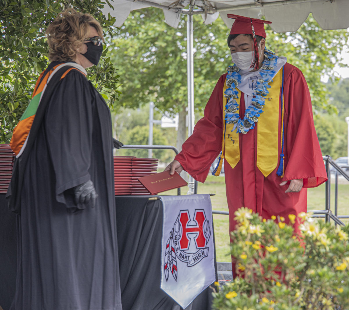 Hart seniors graduate with drive-thru graduation in the morning ...