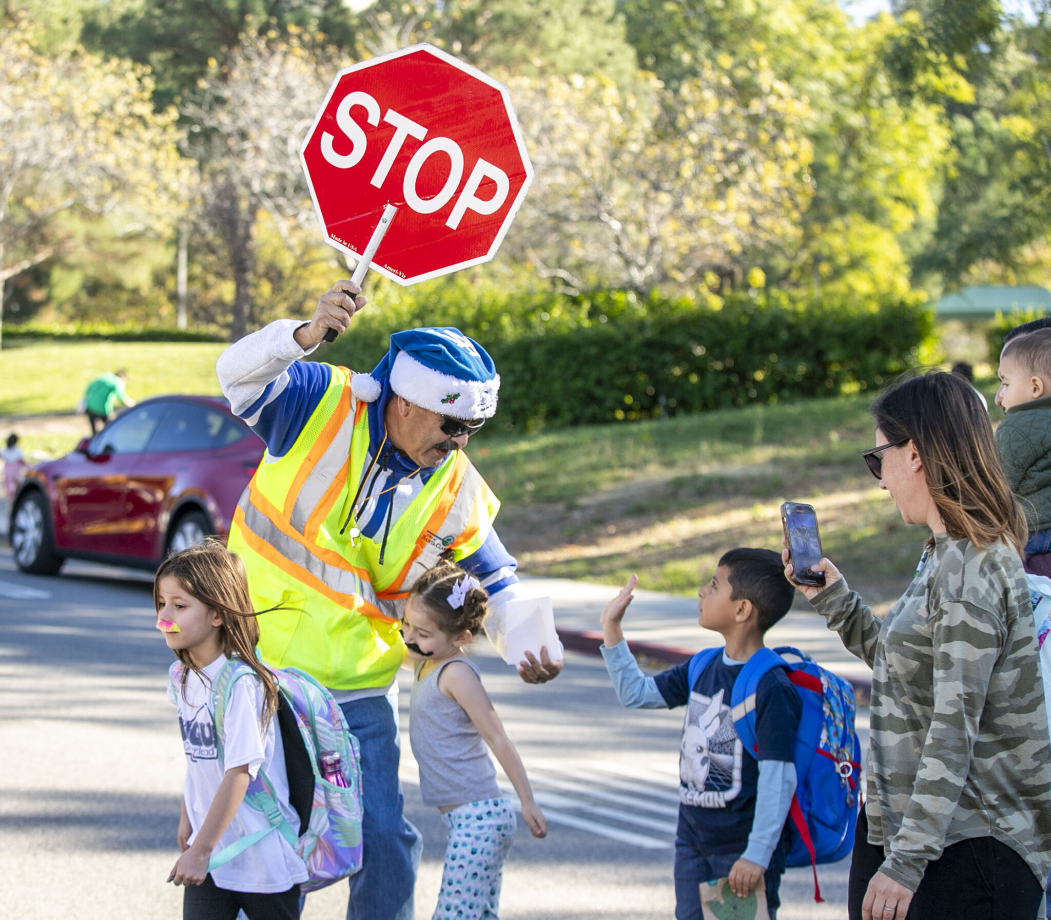 Hats, a mustache and kindness - the perfect recipe for a crossing guard