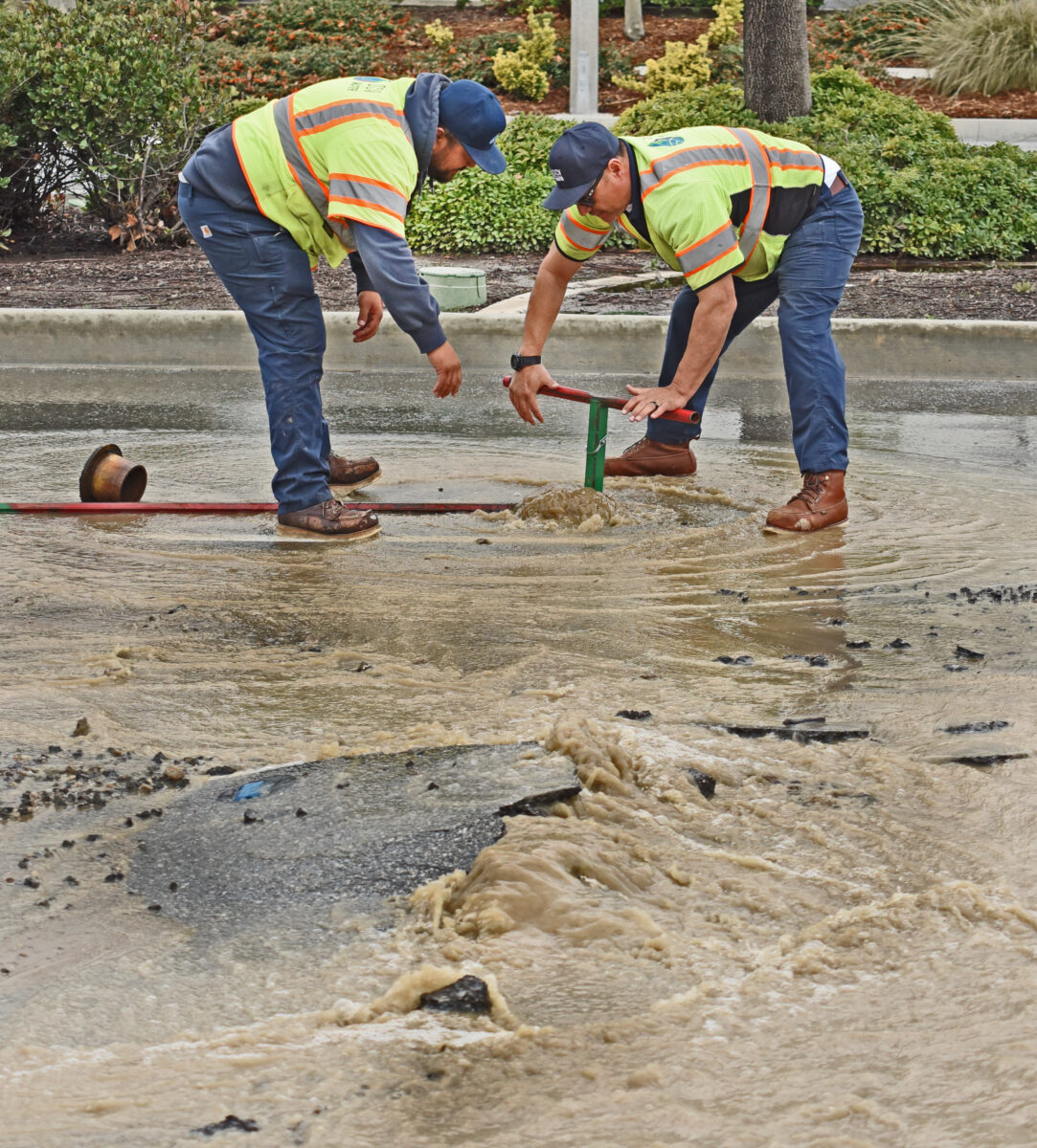 Water main break disrupts service, damages road